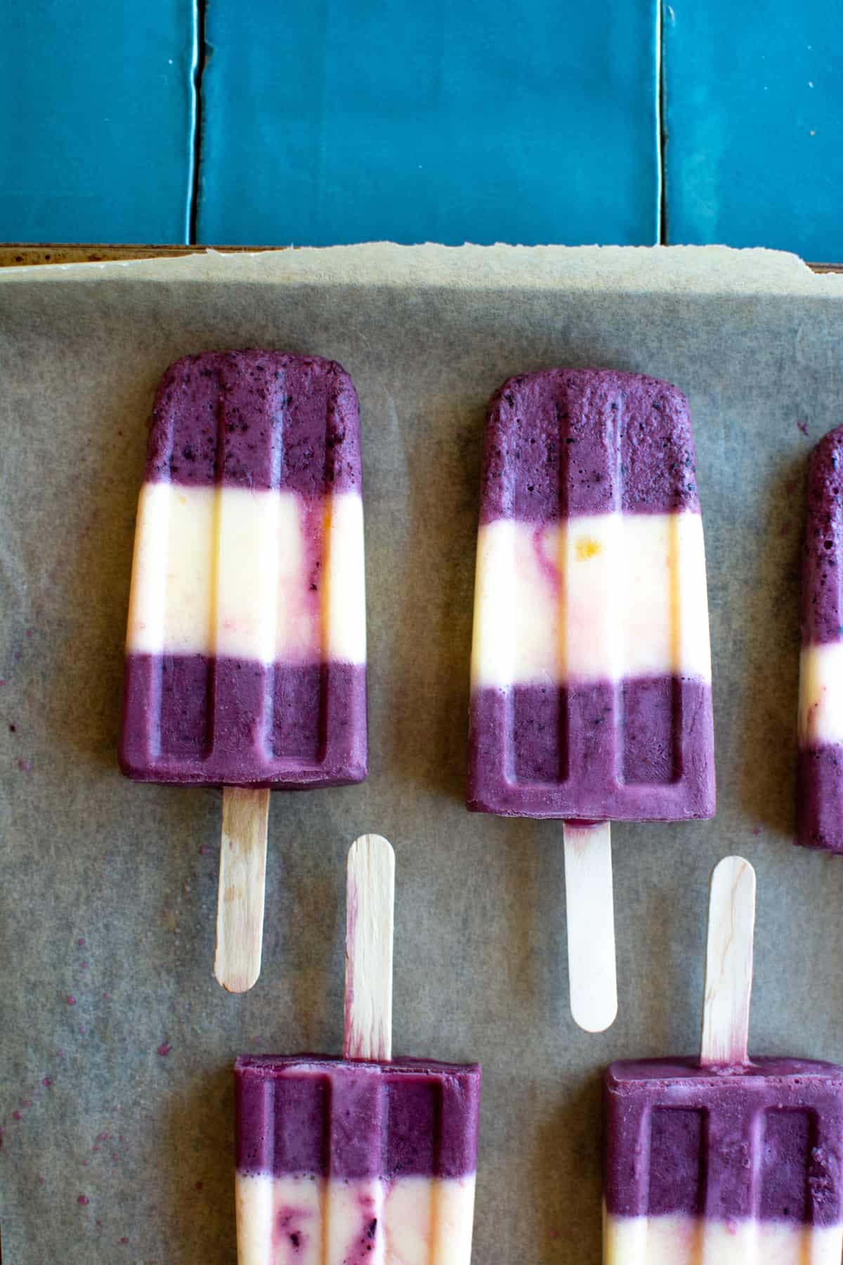 Healthy Peach & Blueberry Striped Yogurt Popsicles - katesbestrecipes.com